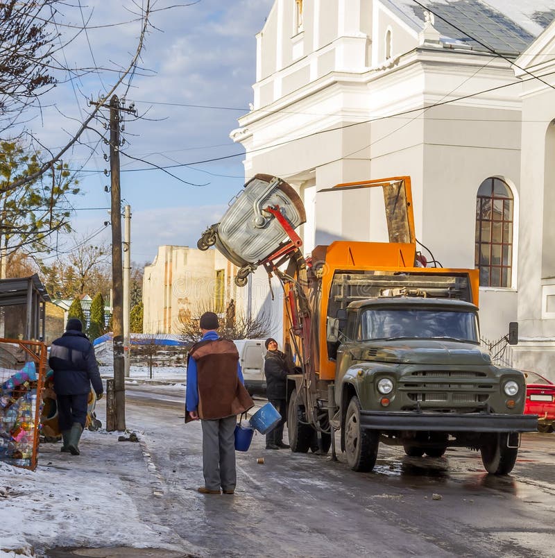 Garbage Collection on a City Street Using a Garbage Truck Editorial ...