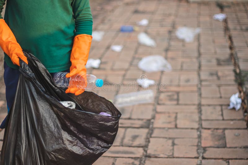 Garbage collection stock image. Image of hand, green - 171326059