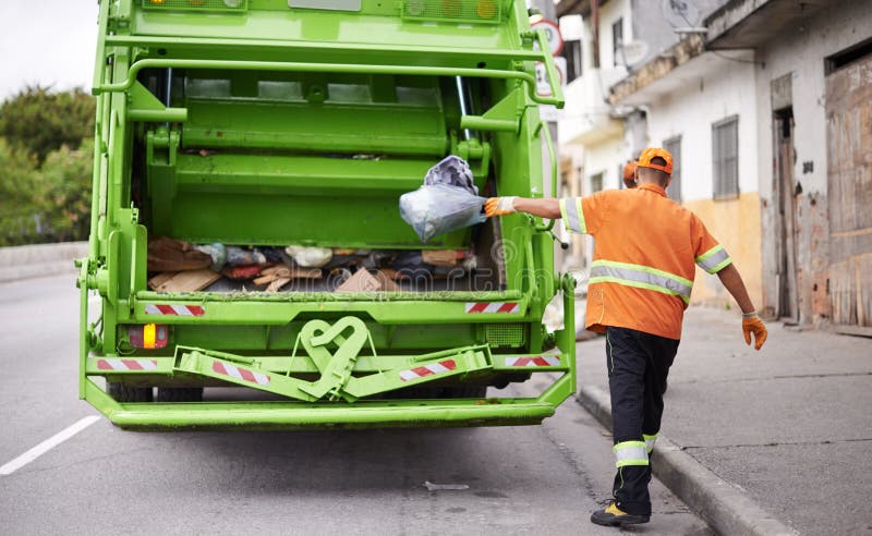 Garbage Collection Day. a Busy Garbage Collection Worker. Stock Image ...