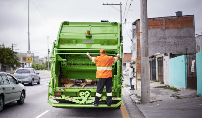 Garbage Collection Day. Cropped Shot of a Busy Garbage Collection ...