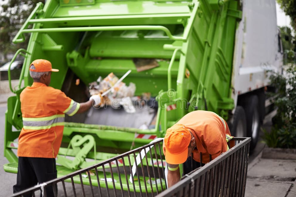 Garbage Collection Day. a Garbage Collection Team at Work. Stock Photo ...