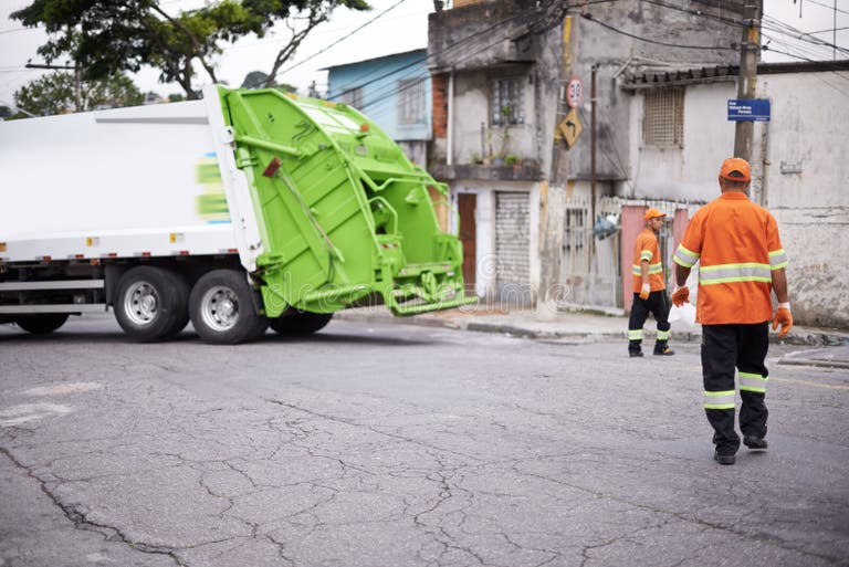 Garbage Collection Day. a Garbage Collection Team at Work. Stock Photo ...
