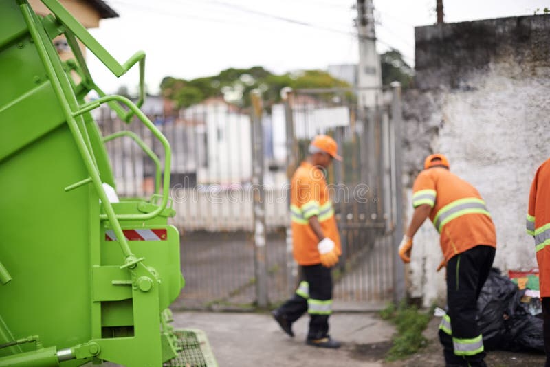 Garbage Collection Day. a Garbage Collection Team at Work. Stock Image ...