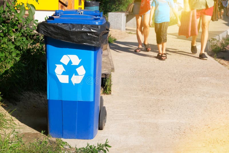 Garbage Collection. Waste Recycling Concept. Blue Containers for ...