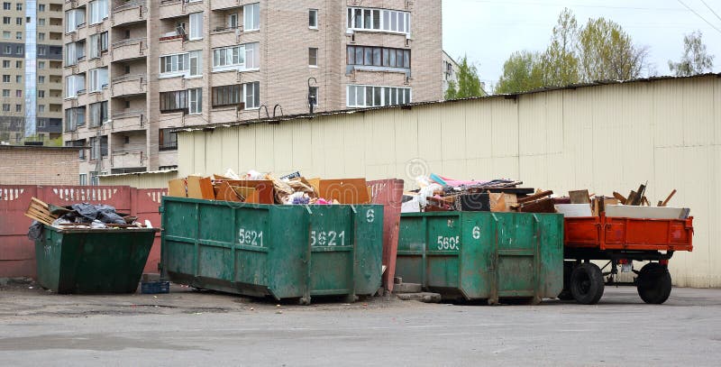 Garbage Containers with Waste in the Yard Editorial Photography - Image ...