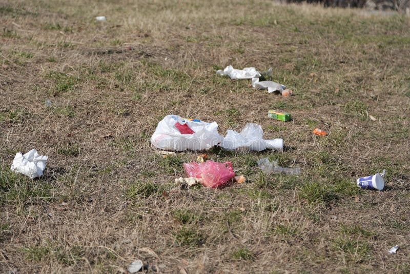 Garbage Dump on the Grass - Ecology Concept Stock Photo - Image of ...