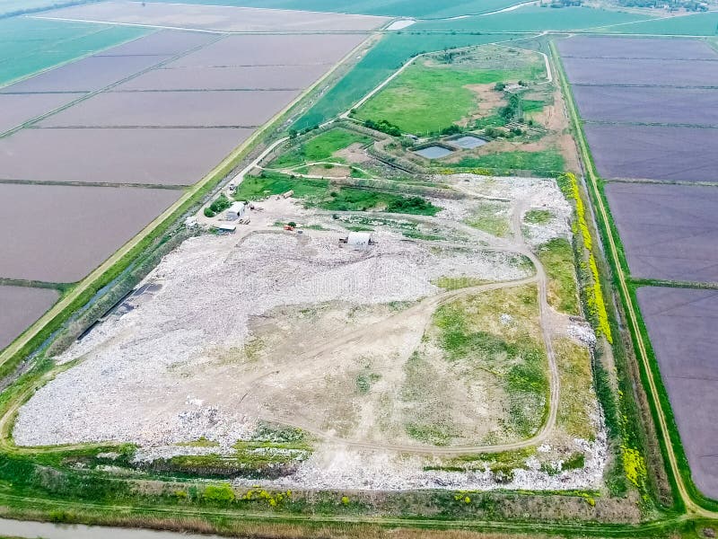 Dump with Heaps of Garbage and Treatment Facilities. Landfill of ...