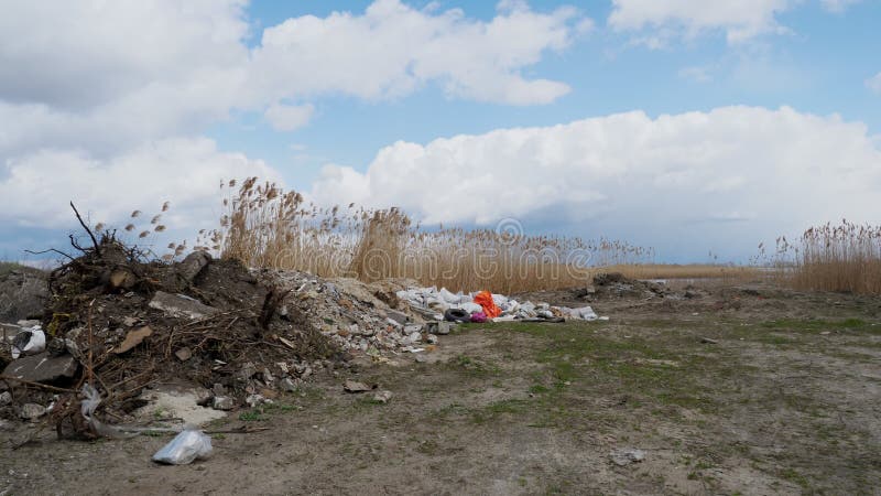 Garbage Dump Near the River. Ecological Problem. Illegal Construction ...