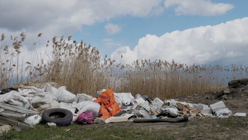 Garbage Dump Near the River. Ecological Problem. Illegal Construction ...