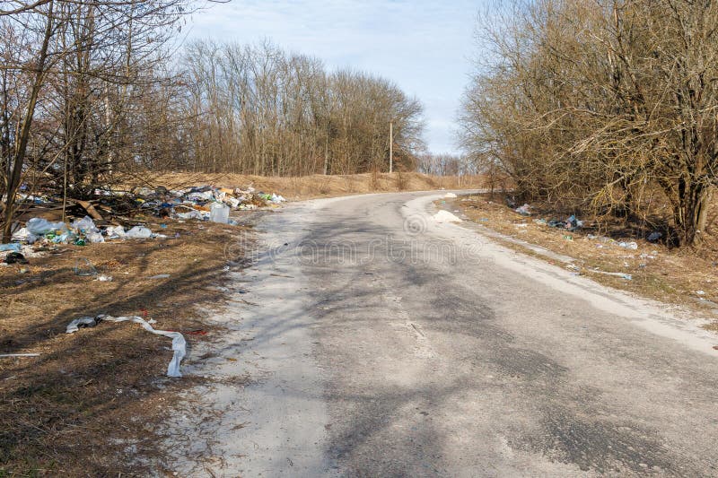 A Garbage Dump on the Side of the Road. a View of Piles of Plastic ...