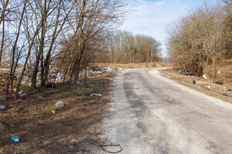 A Garbage Dump on the Side of the Road. a View of Piles of Plastic ...