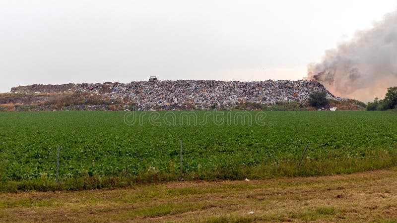 Garbage and Fire Burn in Landfill Cause of Air Pollution, Environmental ...