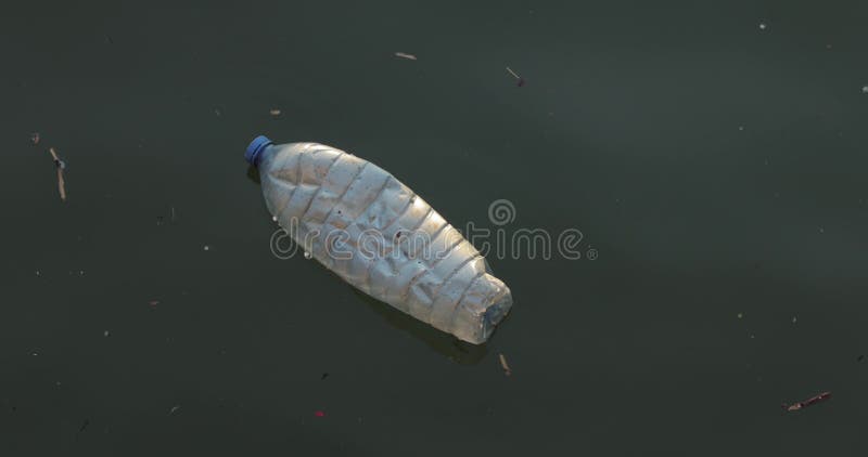 The Garbage in the River with Rock Background Stock Video - Video of ...