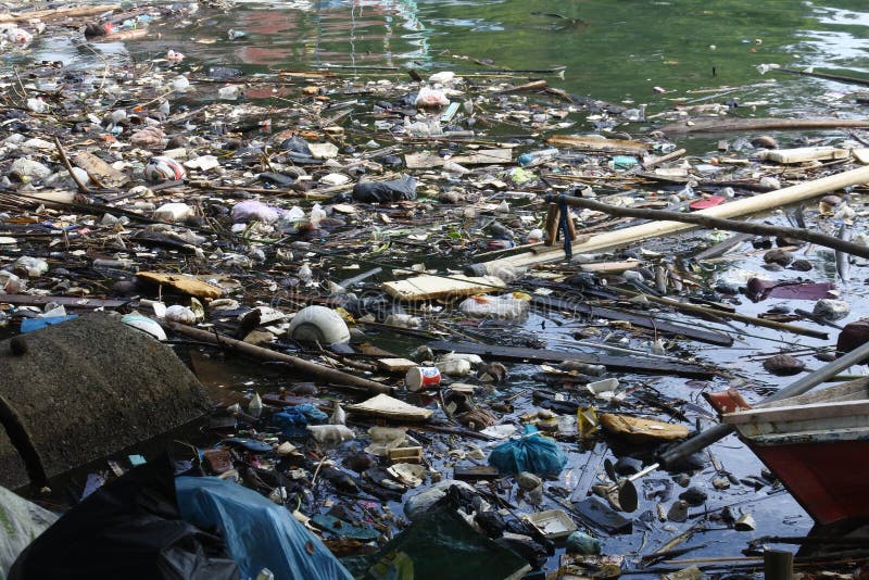 Garbage Floats on the Surface of the Sea. Global Warming Issue Stock ...