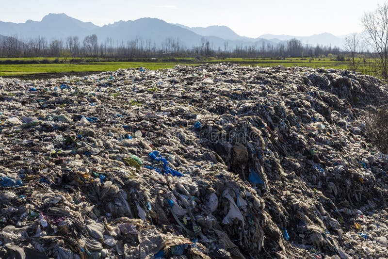 Garbage Landfill Site in the Fields Stock Photo - Image of stack ...