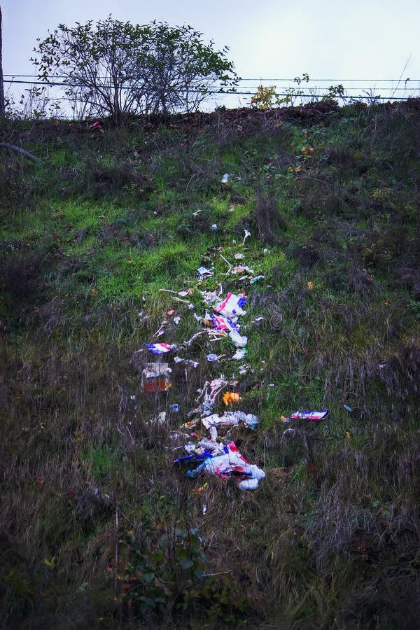 Garbage Lies on the Edge of the Road Stock Photo - Image of pile ...