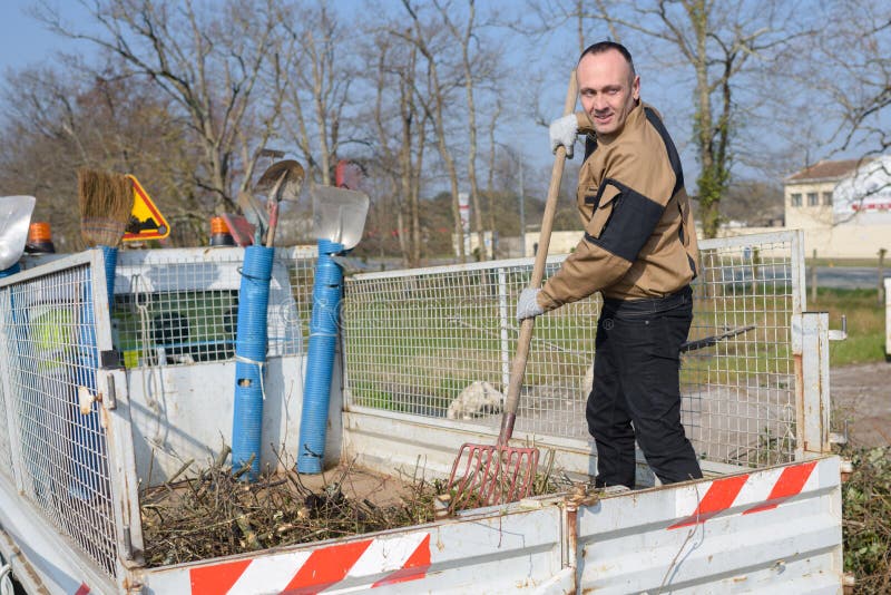 Garbage Man at Work on Truck Stock Photo - Image of plastic, dustman ...