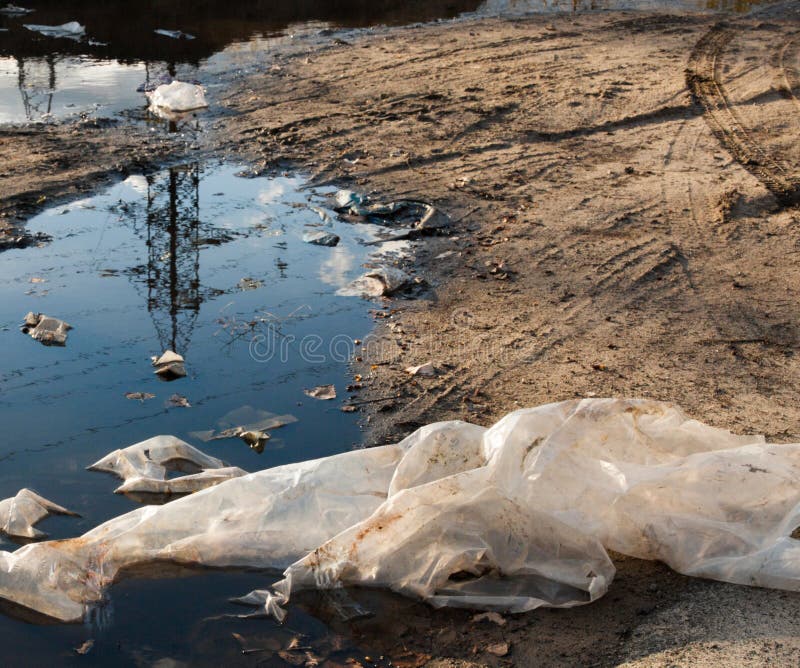 Garbage in the Mud on the Dirt Road Stock Image - Image of landfill ...