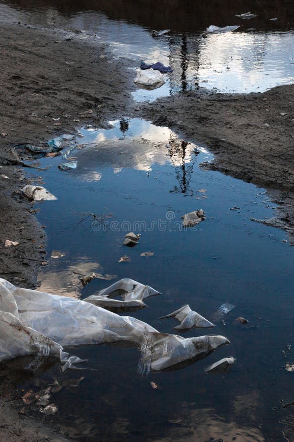 Garbage in the Mud on the Dirt Road Stock Photo - Image of muddy, dump ...