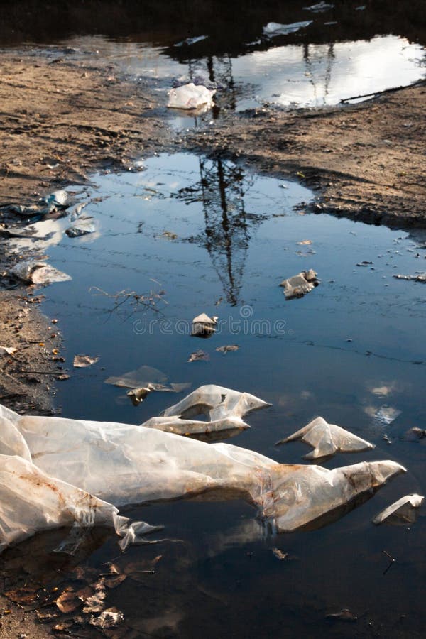 Garbage in the Mud on the Dirt Road Stock Image - Image of messy, earth ...
