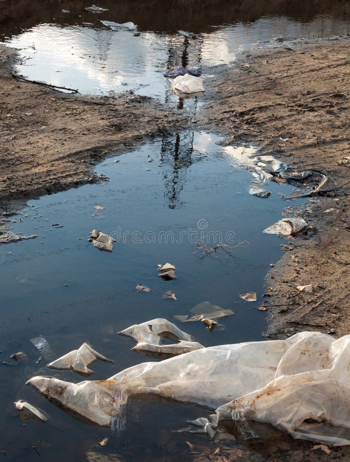 Garbage in the Mud on the Dirt Road Stock Image - Image of catastrophe ...