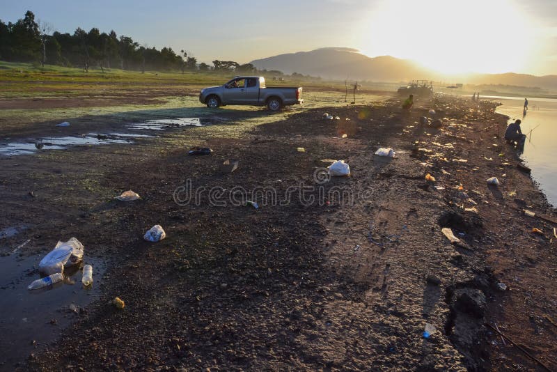 Garbage near the lake editorial image. Image of trash - 45640955
