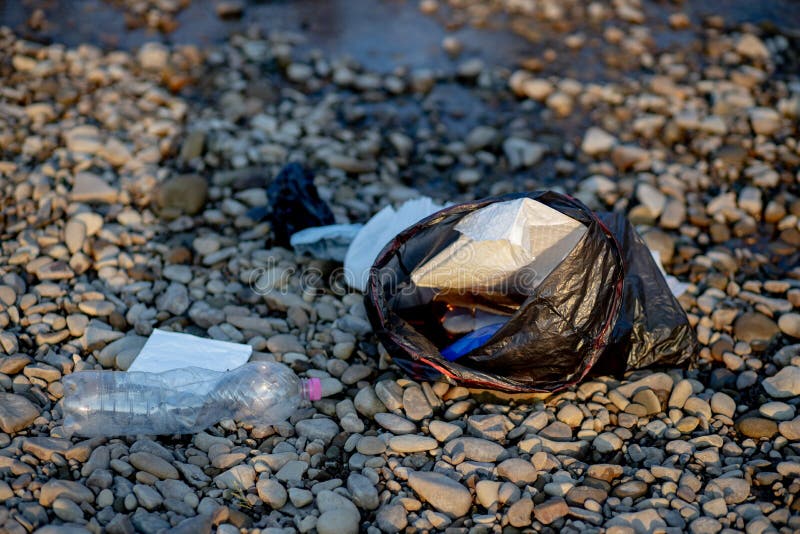 Garbage Near the River. Environmental Pollution Shore Stock Image ...