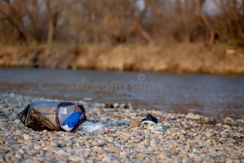 Garbage Near the River. Environmental Pollution Shore Stock Image ...