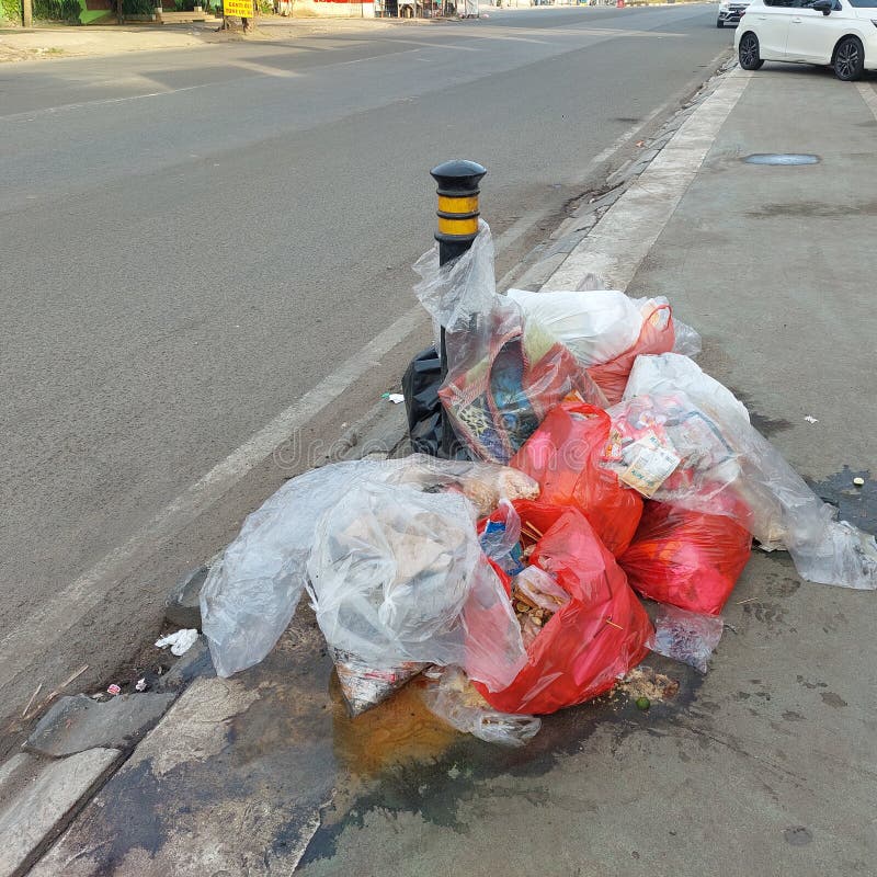 Garbage Piled Up on the Side of the Road Stock Image - Image of ...