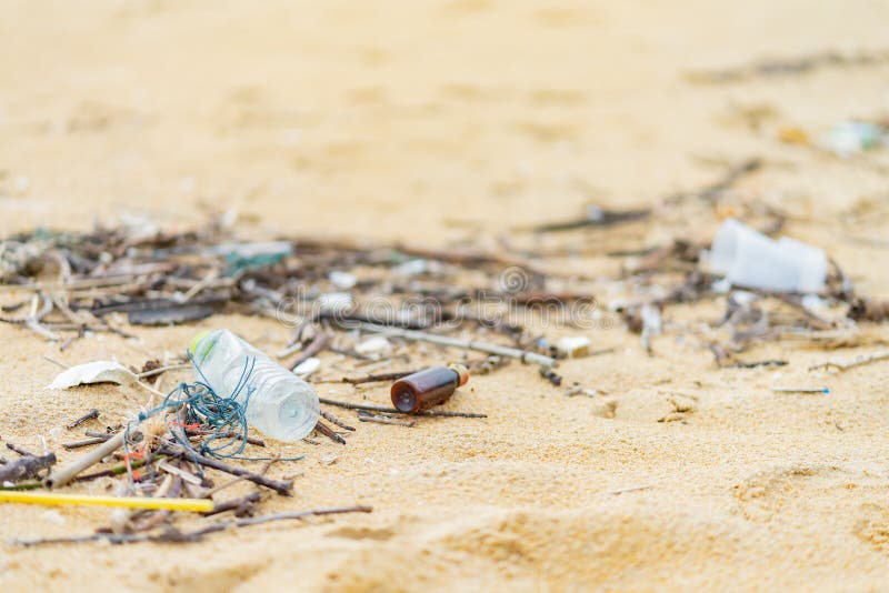 Garbage on sand beach stock photo. Image of sand, resource - 188057726