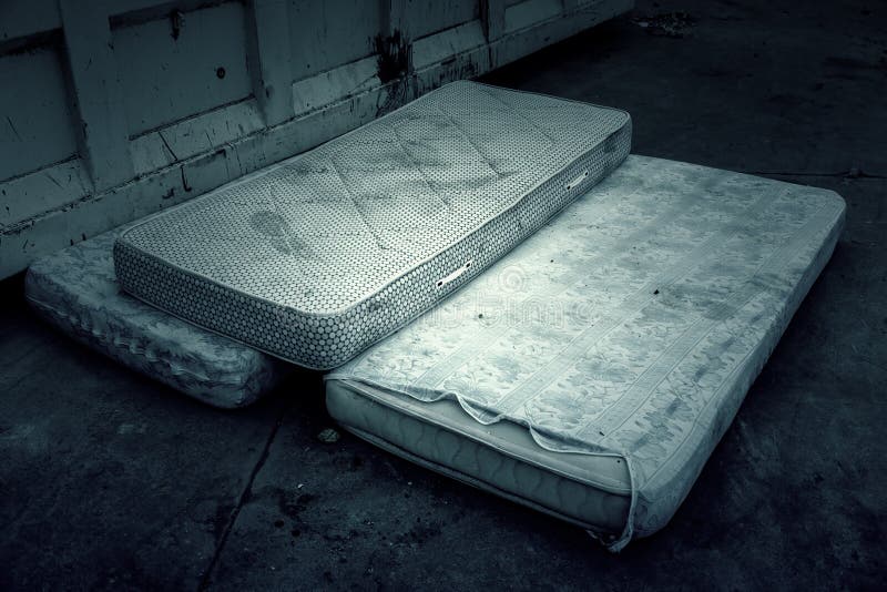 Mattresses in the trash stock photo. Image of bedroom - 255312492