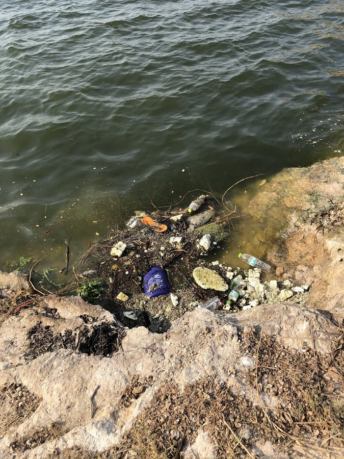 Garbage in river stock image. Image of colorful, ecological - 183635825