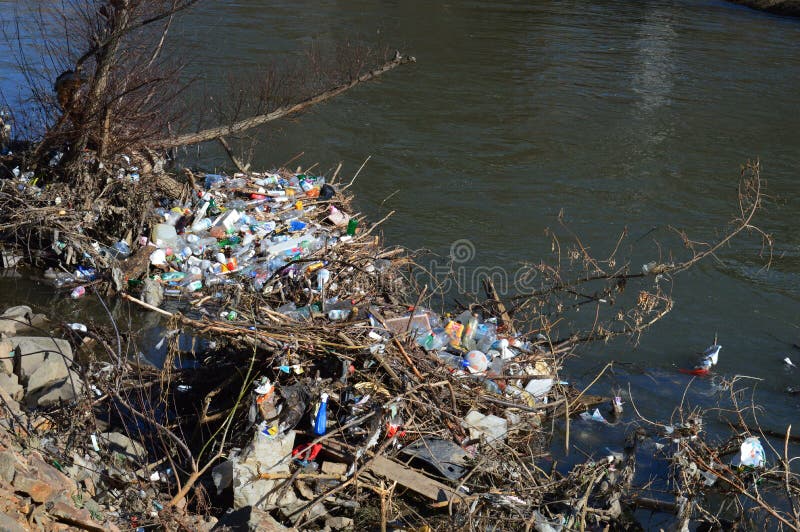 Garbage in the river stock photo. Image of water, garbage - 139213100