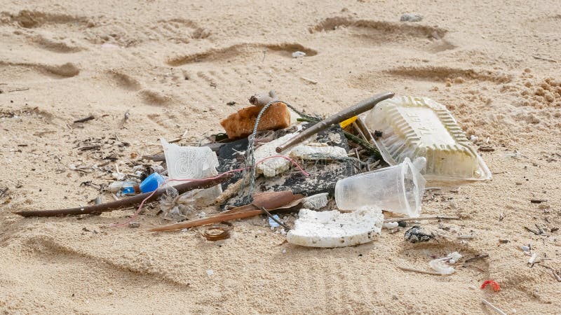 Garbage on sand beach stock image. Image of toxic, rubbish - 187480911