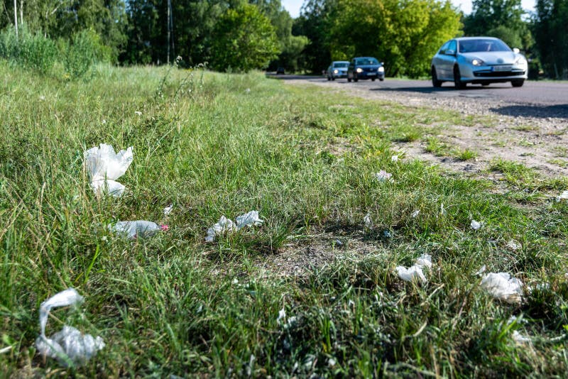 Garbage Scattered On The Road In The Field, The Debris Field ...