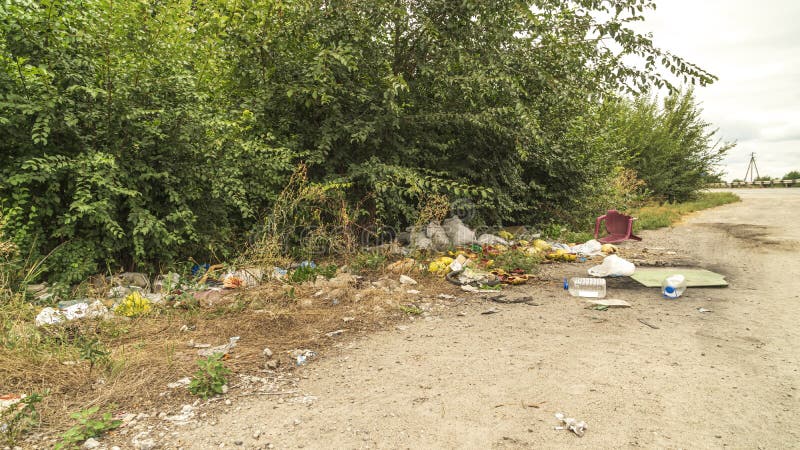 The Driver Throw Garbage on the Side of the Road. Stock Photo - Image ...