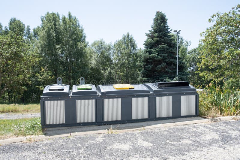 Garbage sorting bins stock photo. Image of recycle, city - 334328516