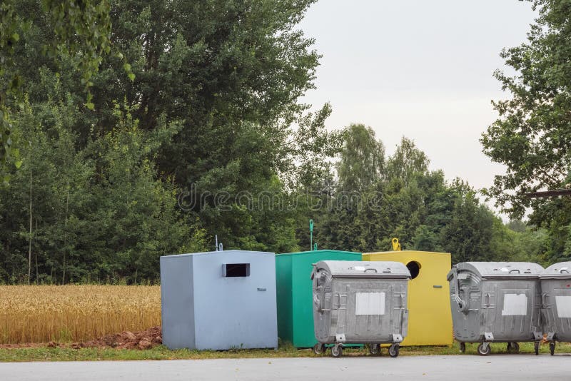 .garbage Stations in Green and Yellow and Blue are Placed in the Park ...