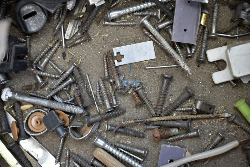 Garbage of Tools and Bolts and Nuts in the Drawer Stock Photo - Image ...