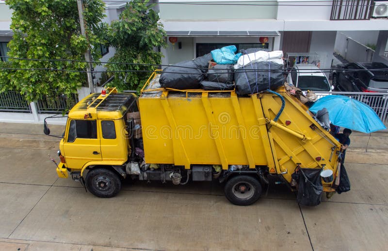 A Garbage Truck is Driving on the Street Stock Image - Image of dirty ...