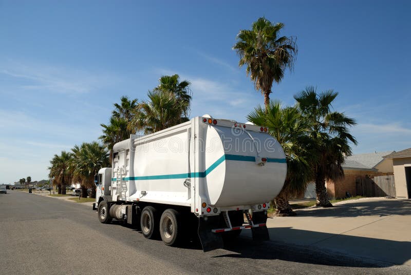 Garbage Truck in Action stock photo. Image of dispose - 19280724