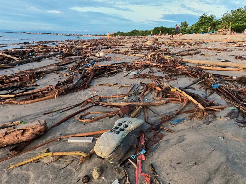 Garbage Washed Up on the Beach from the Ocean after High Tide. an ...