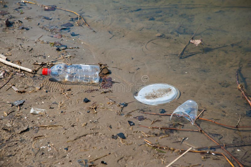 Garbage Waste on the Shore of a River Stock Image - Image of rubbish ...