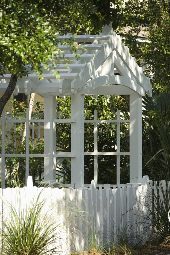 Garden arbor with trees. stock photo. Image of trellis - 2038246
