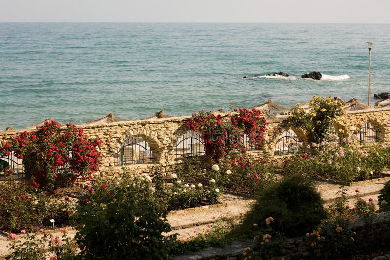 Garden beach stock image. Image of wall, rock, fence - 10334701