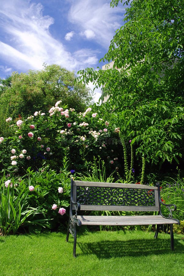 Peaceful bench in garden stock image. Image of tree, rest - 26594335