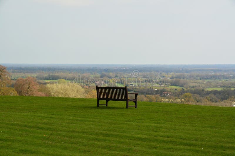 A Garden Bench in Nature with a View of the Fields of England. Stock ...