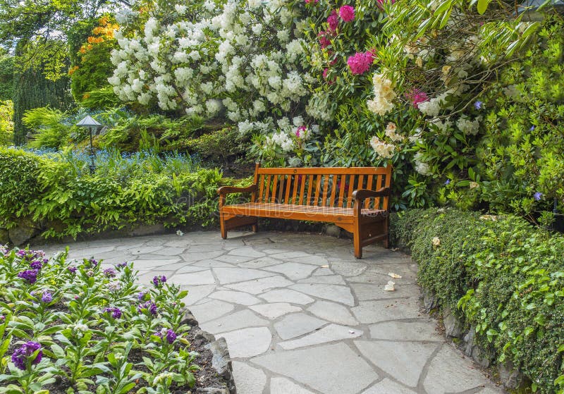 Garden bench stock image. Image of pathway, yellow, walkway - 41288143