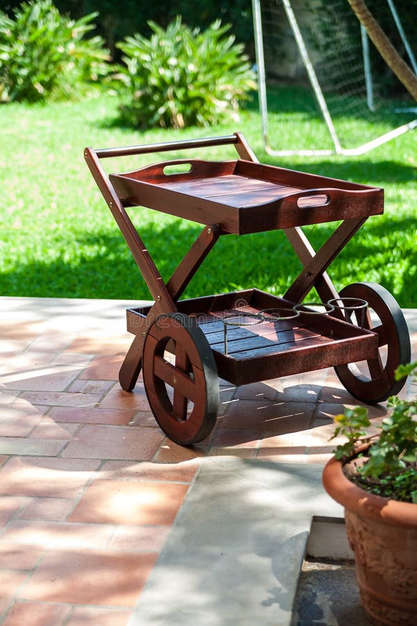 Garden Cart and Swimming Pool Stock Image - Image of grass, serves ...