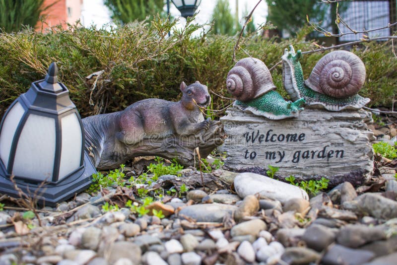Garden Characters among Plants and Stones Stock Photo - Image of stones ...